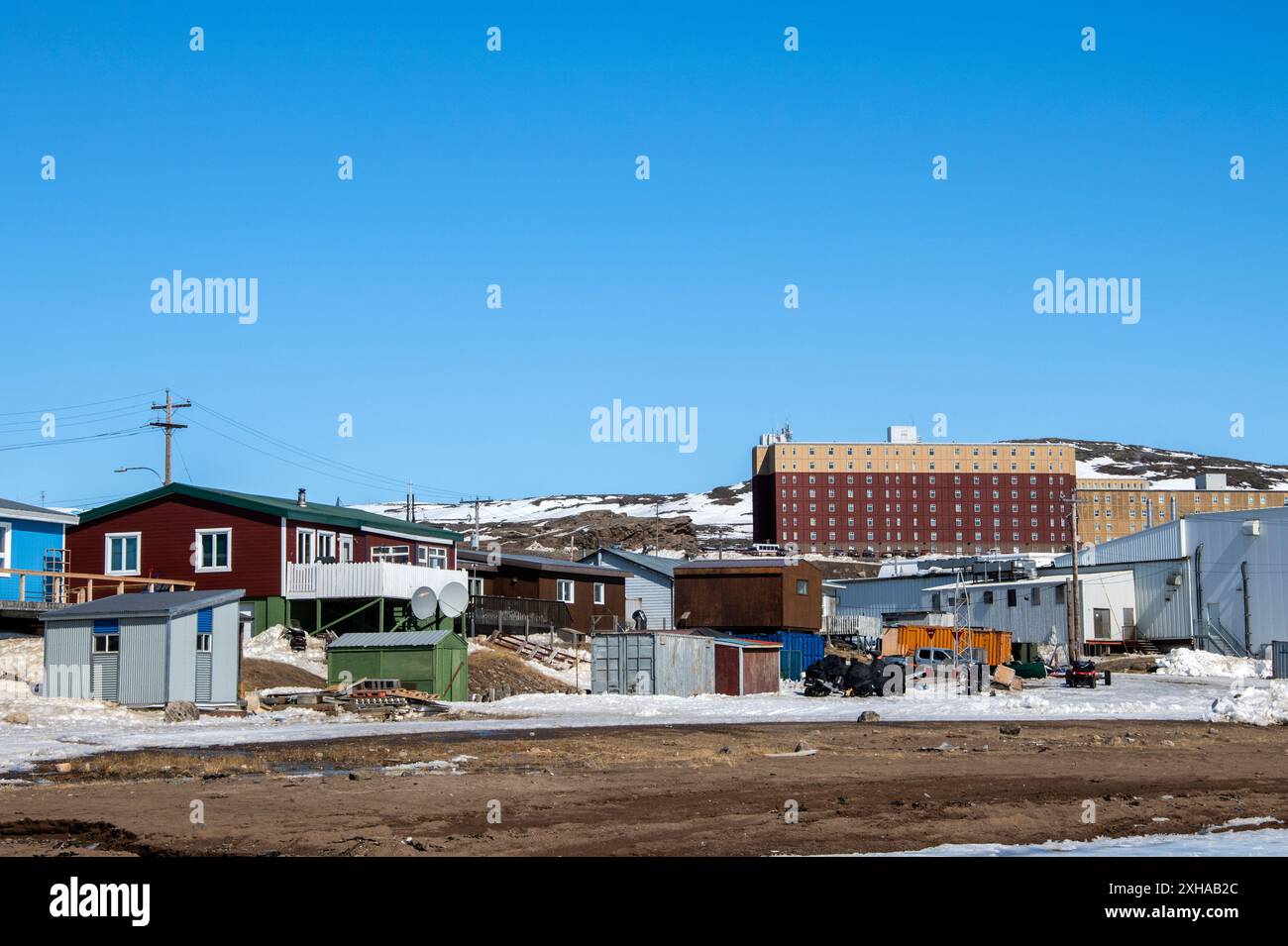 View of the houses taken from the beach on Frobisher Bay in Iqaluit ...