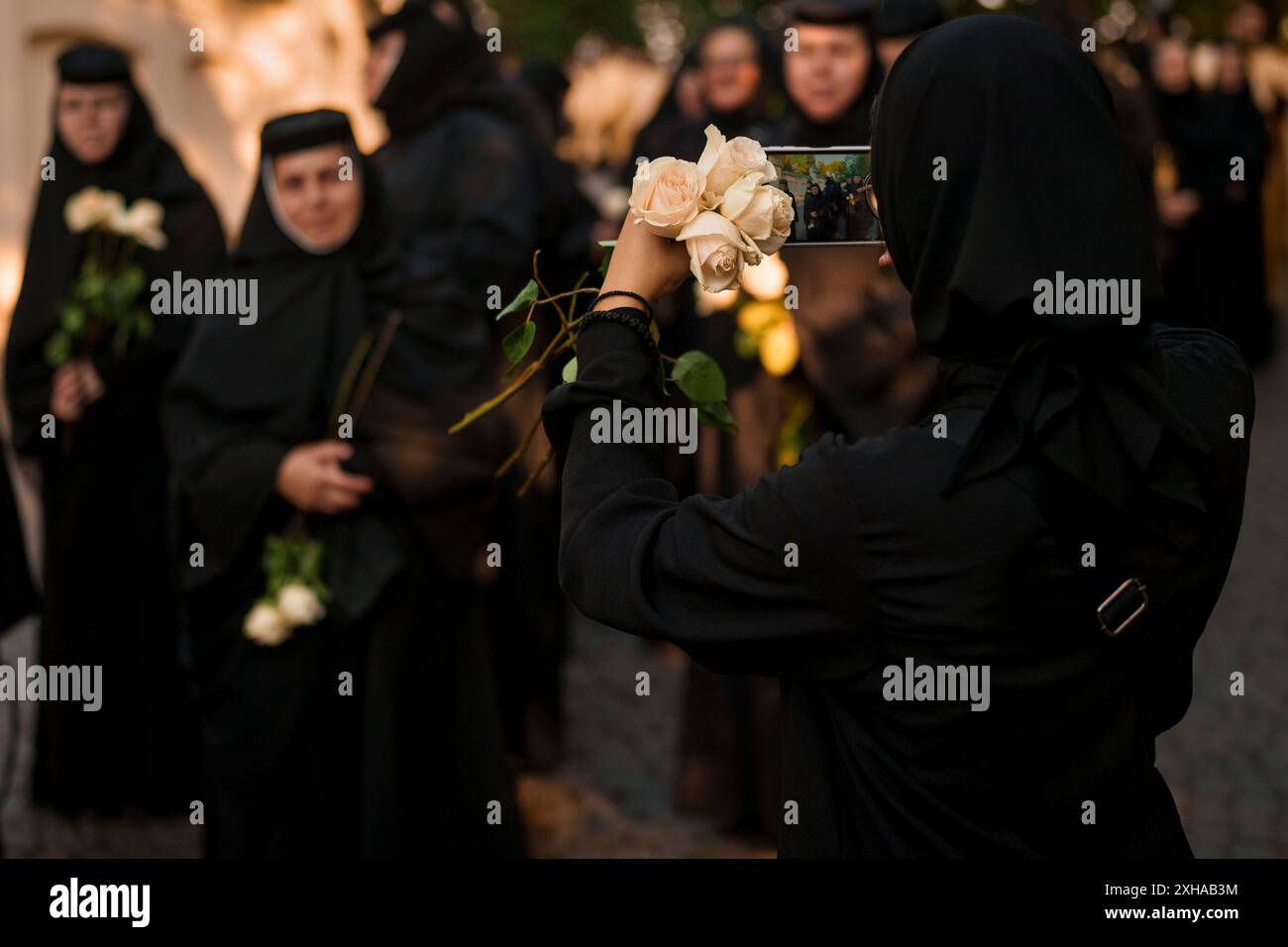 Orthodox nuns pose for a photo while waiting to take part in a ...