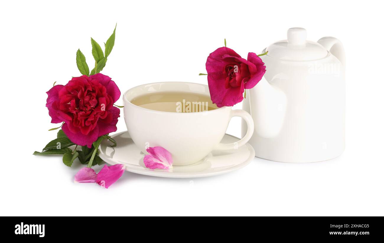 Aromatic herbal tea with rose flowers isolated on white Stock Photo - Alamy