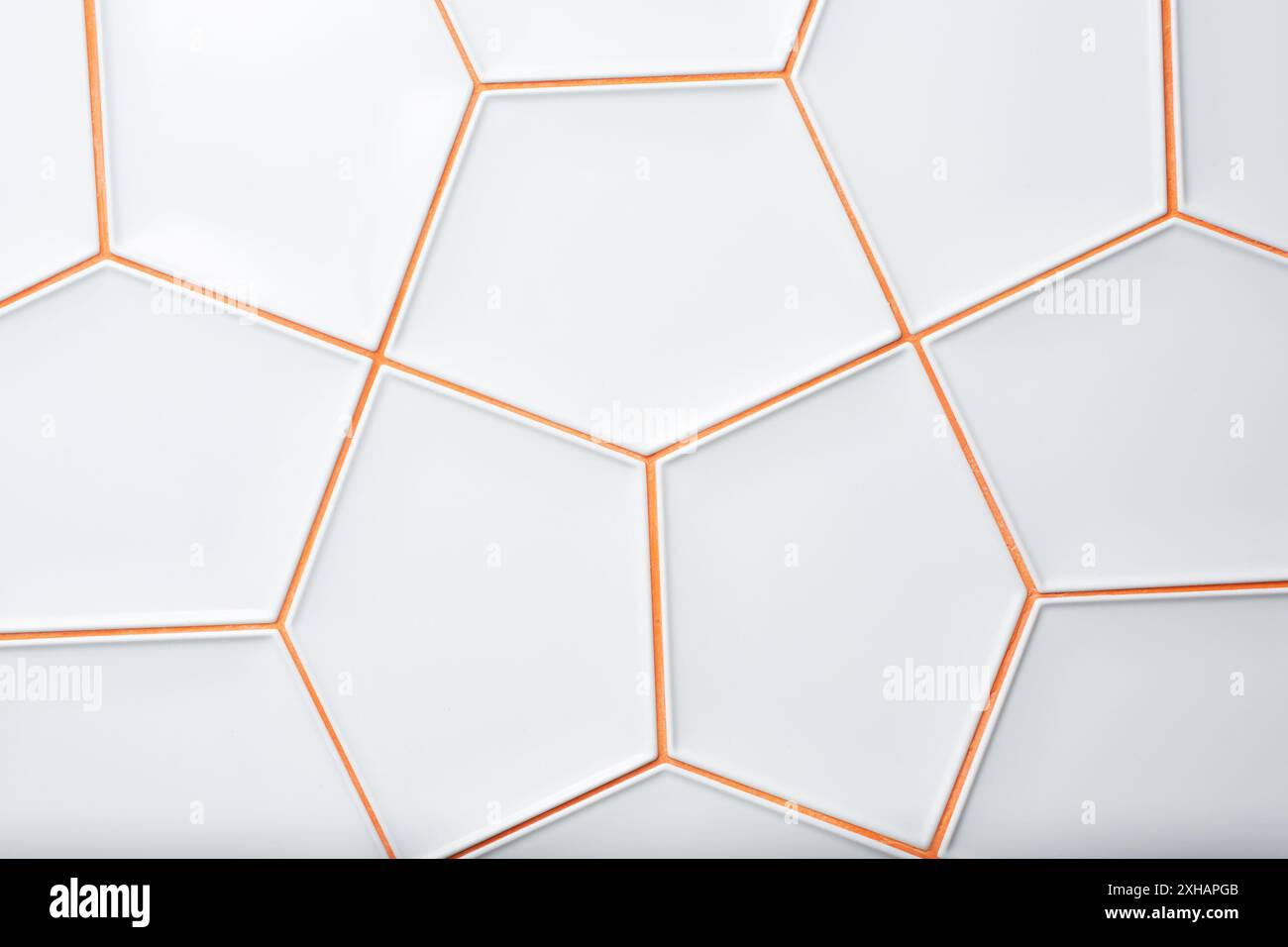A view of a wall background of pentagon shaped tile Stock Photo - Alamy