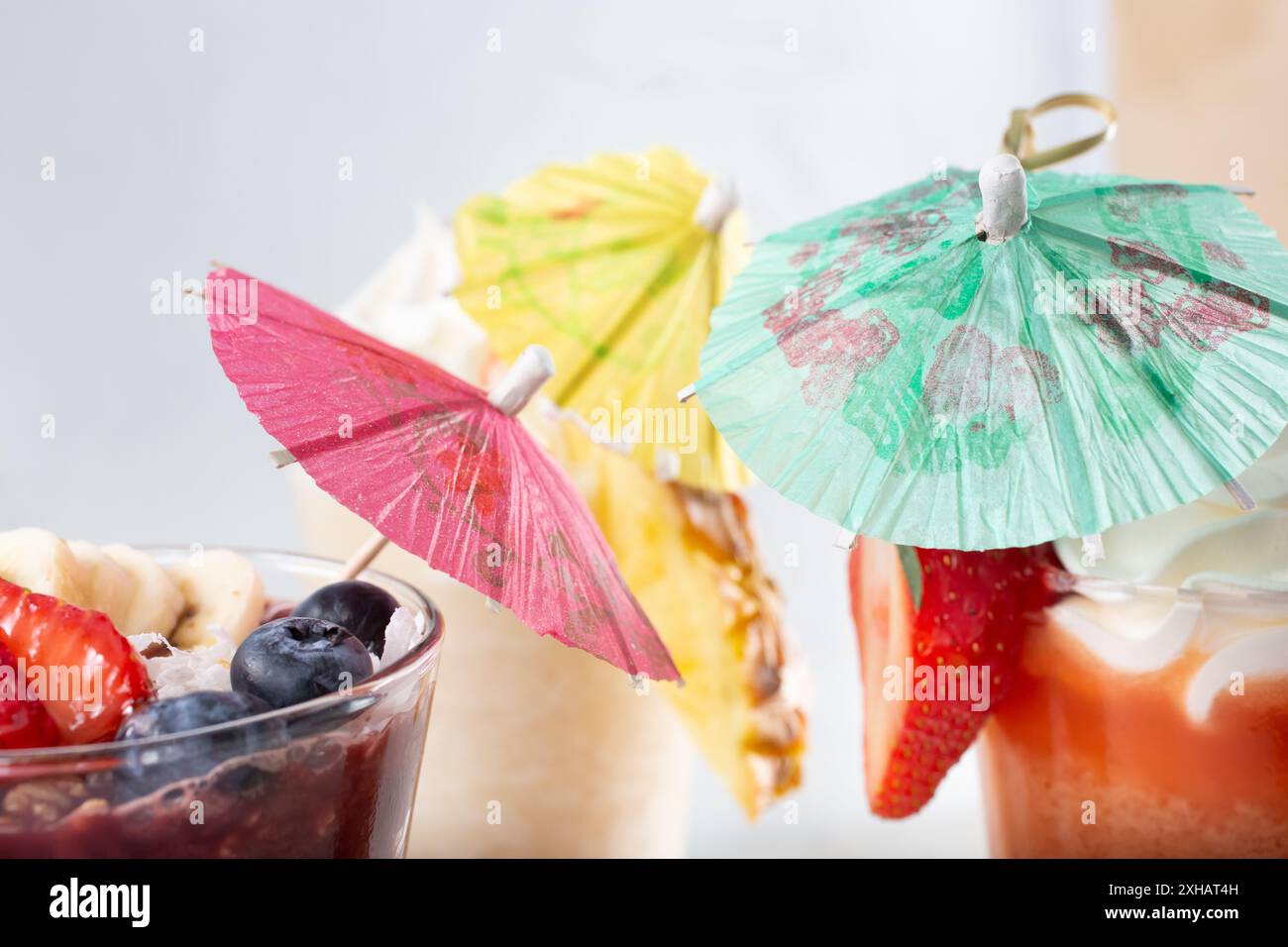 A closeup view of paper drink umbrella garnishes Stock Photo - Alamy