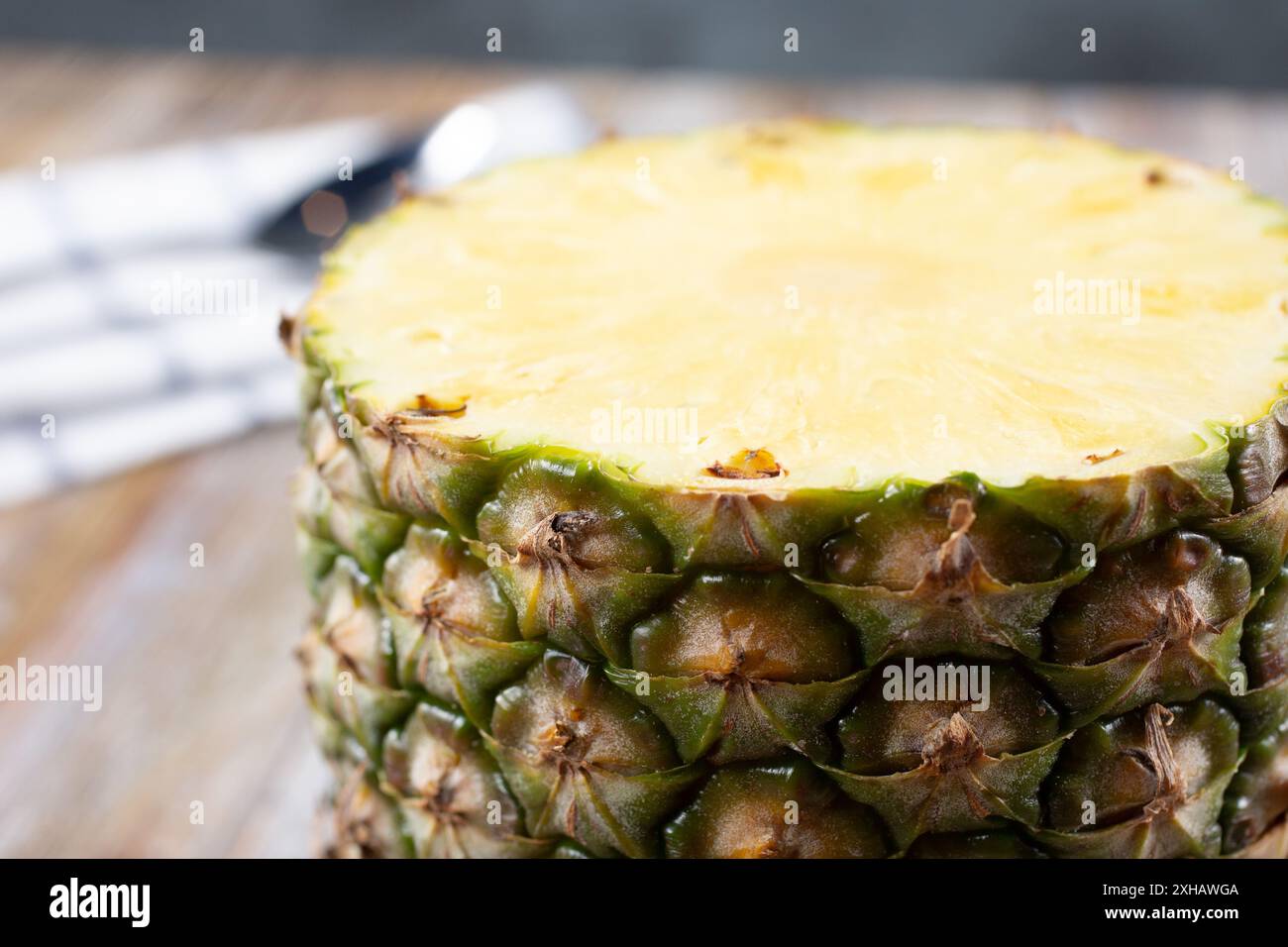 A closeup view of a the bottom half of a pineapple Stock Photo - Alamy
