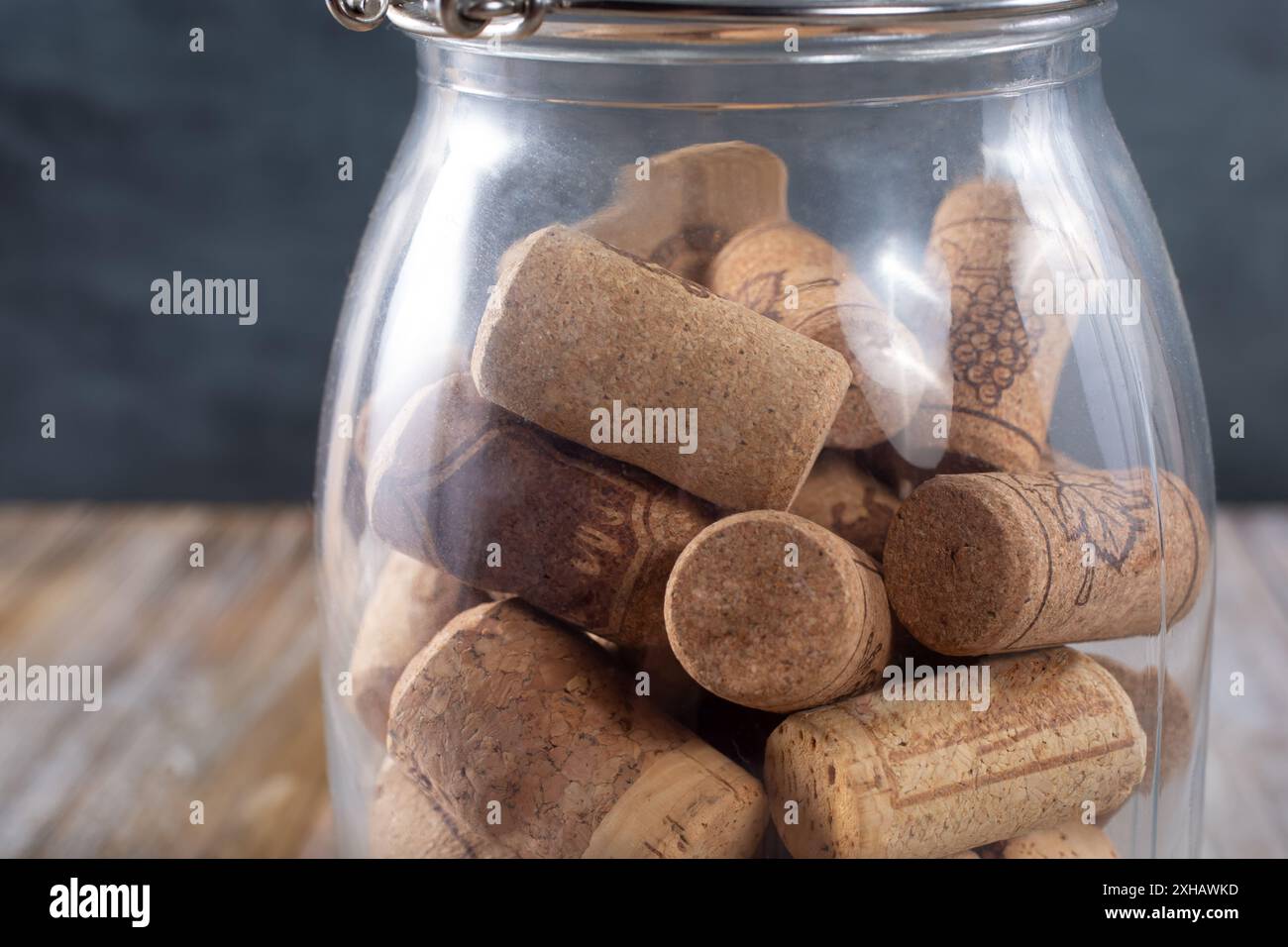A view of many wine corks inside a glass jar Stock Photo - Alamy