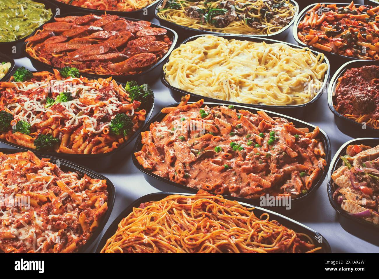 A view of several varieties of pasta trays, featuring Arrabiatta and ...