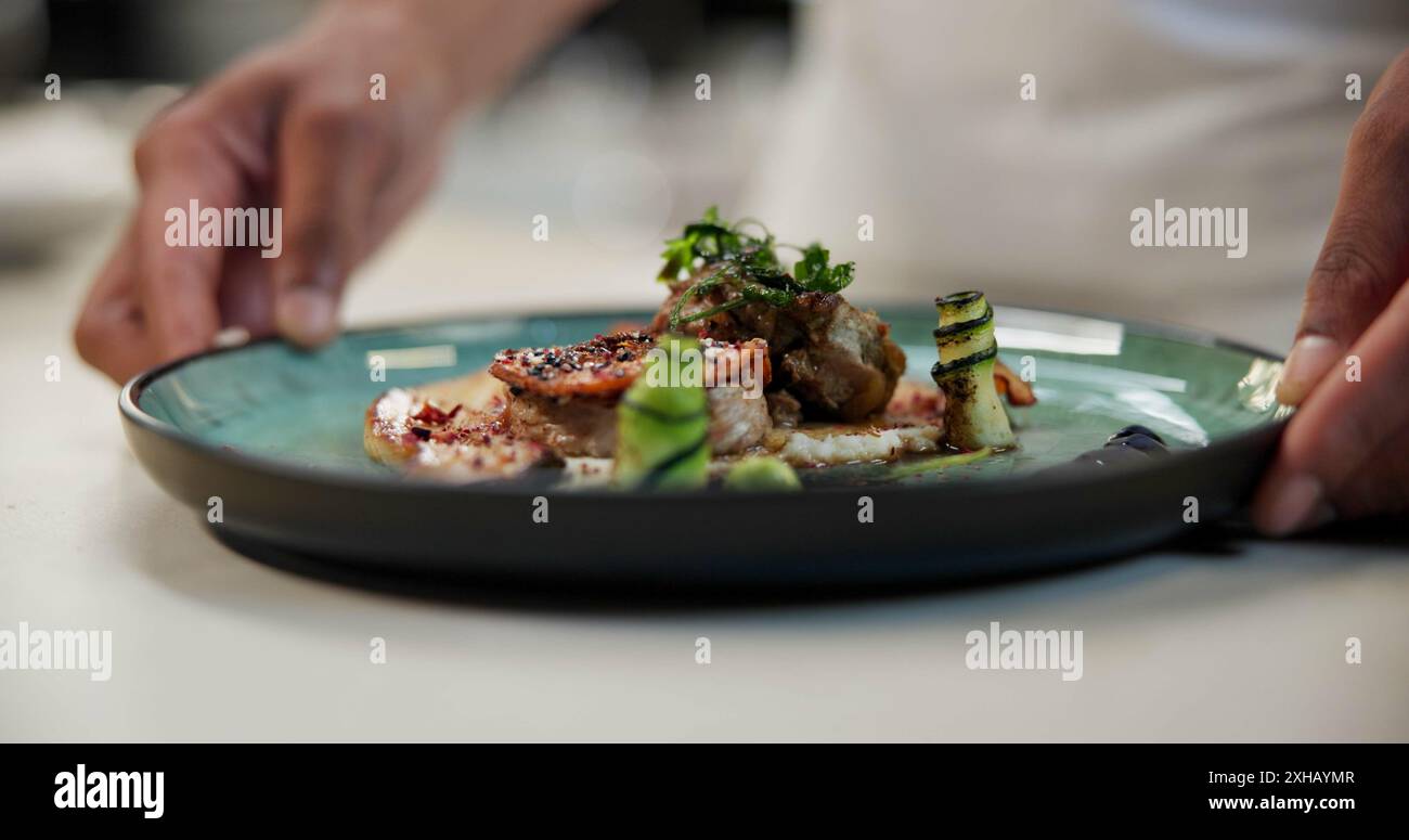 Hands, food or person with ready dish in fine dining, culinary ...