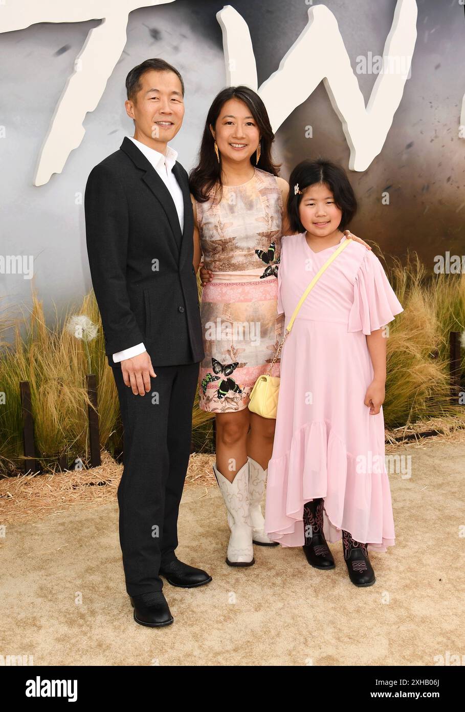 LOS ANGELES, CALIFORNIA - JULY 11: Lee Isaac Chung (L) and family ...
