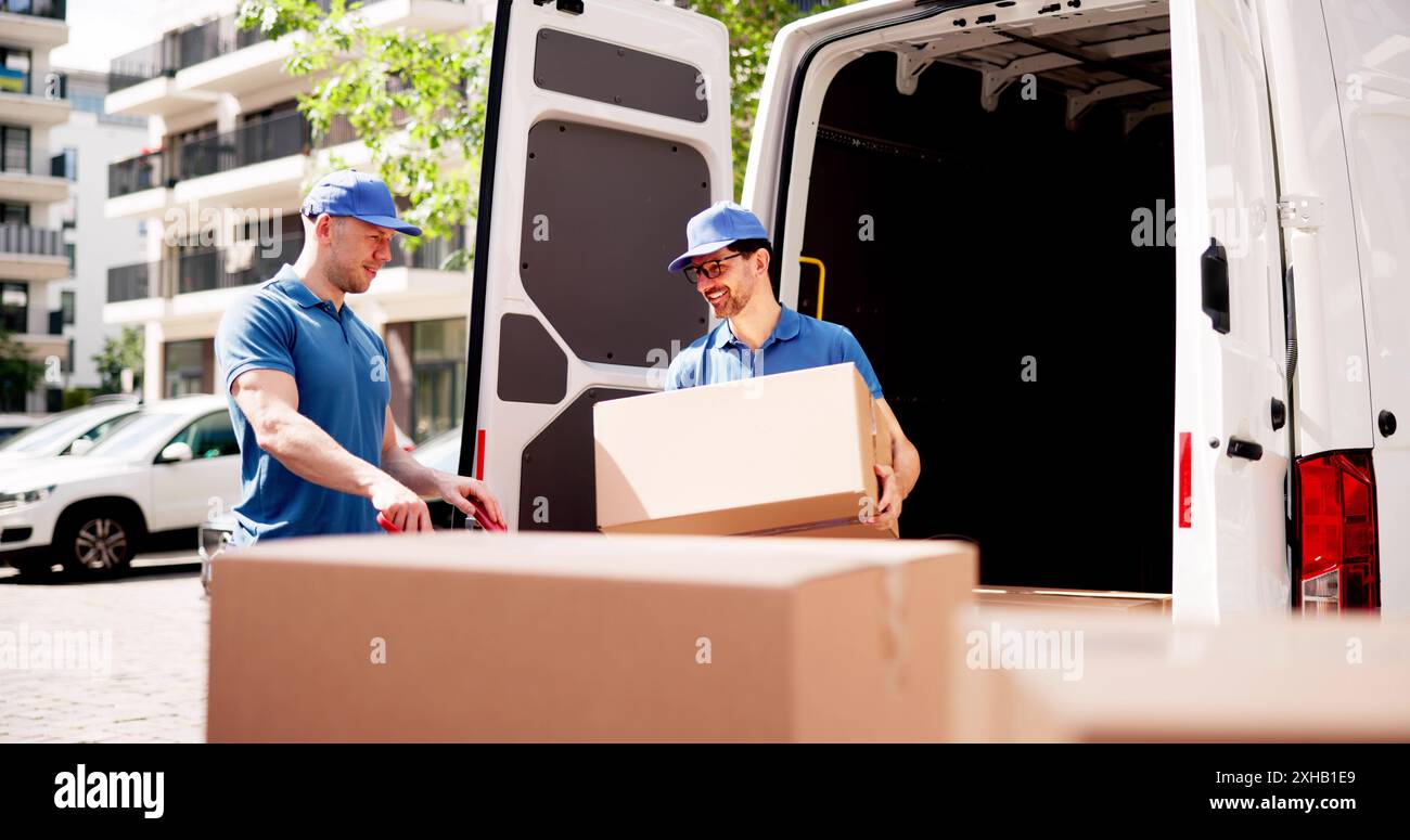 Certified Mover unloading van and carrying boxes for approved moving ...