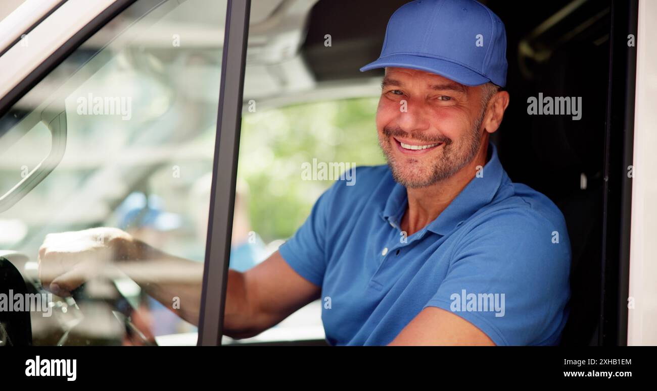 The Fulfillment of Logistics: Smiling Courier Man in Uniform Driving ...