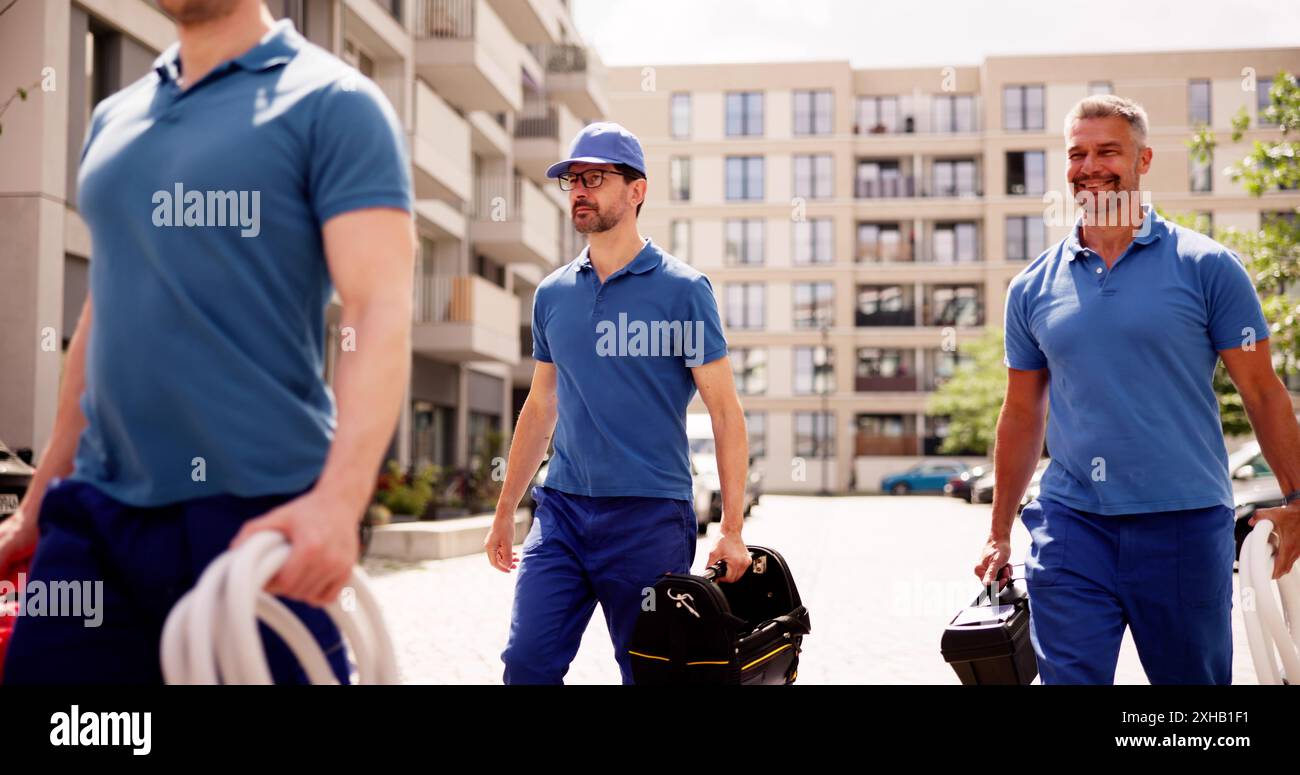 Professional Maintenance Team Ready for Business: Skilled Electrician ...