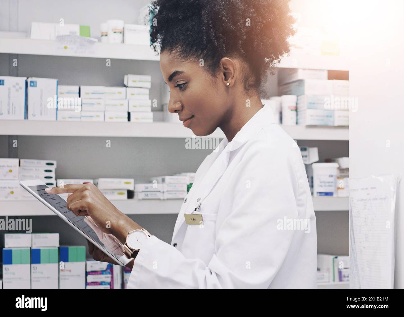 Pharmacy, woman and tablet with healthcare, typing and internet with ...