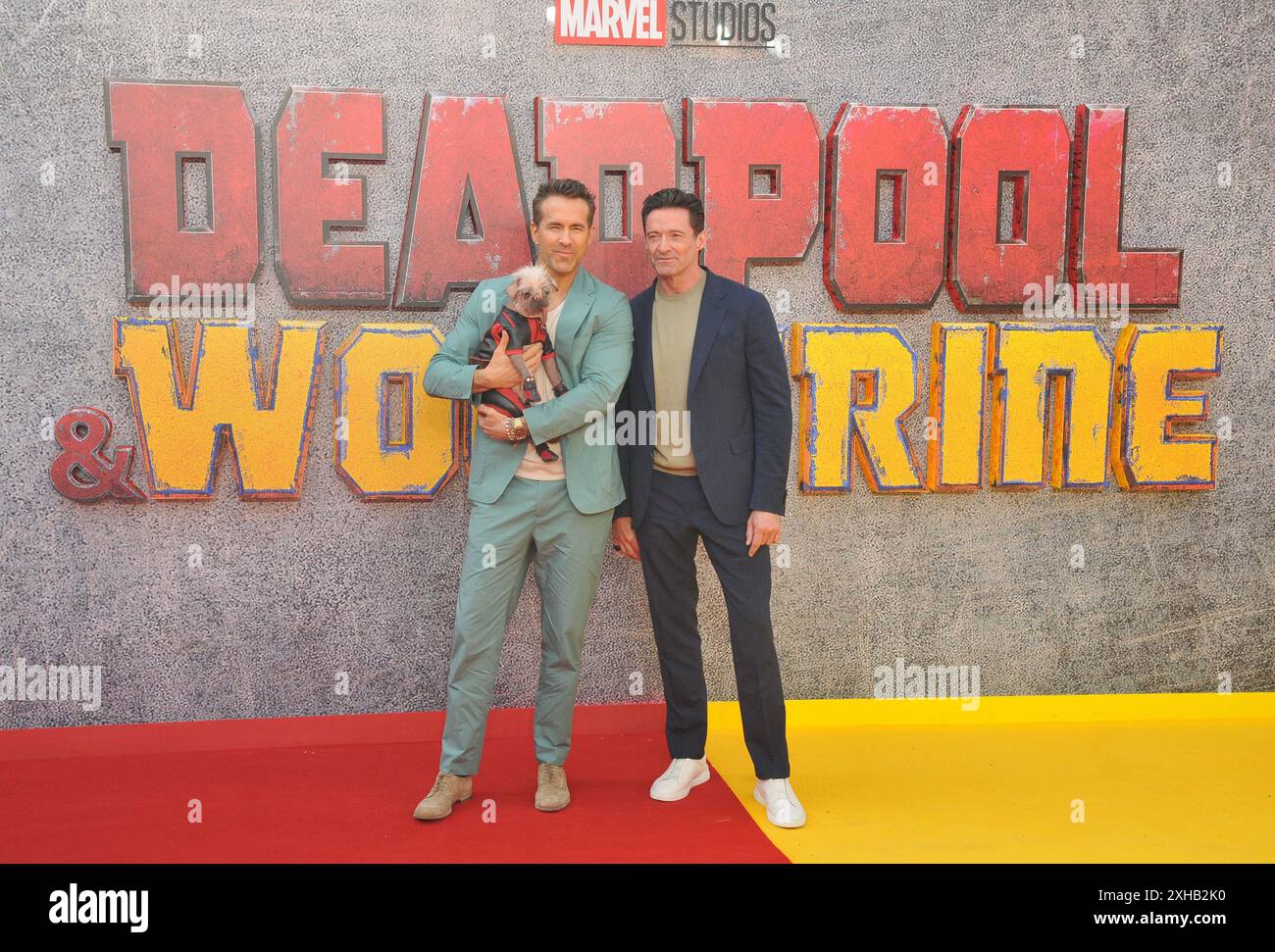 Peggy the dog, Ryan Reynolds and Hugh Jackman at the "Deadpool ...