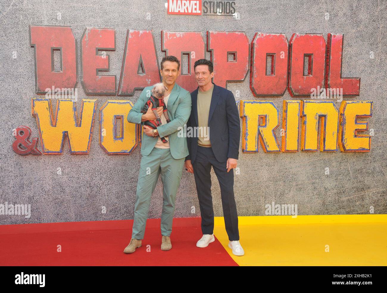 Peggy the dog, Ryan Reynolds and Hugh Jackman at the "Deadpool ...