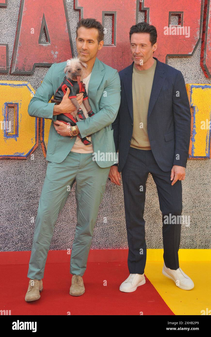Peggy the dog, Ryan Reynolds and Hugh Jackman at the "Deadpool ...