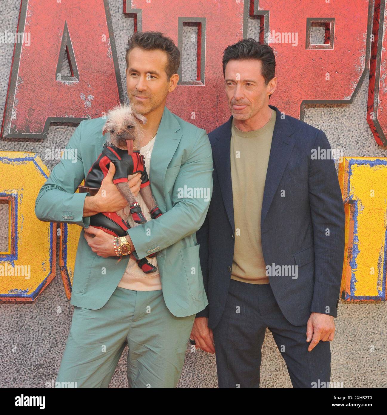 Peggy the dog, Ryan Reynolds and Hugh Jackman at the "Deadpool ...