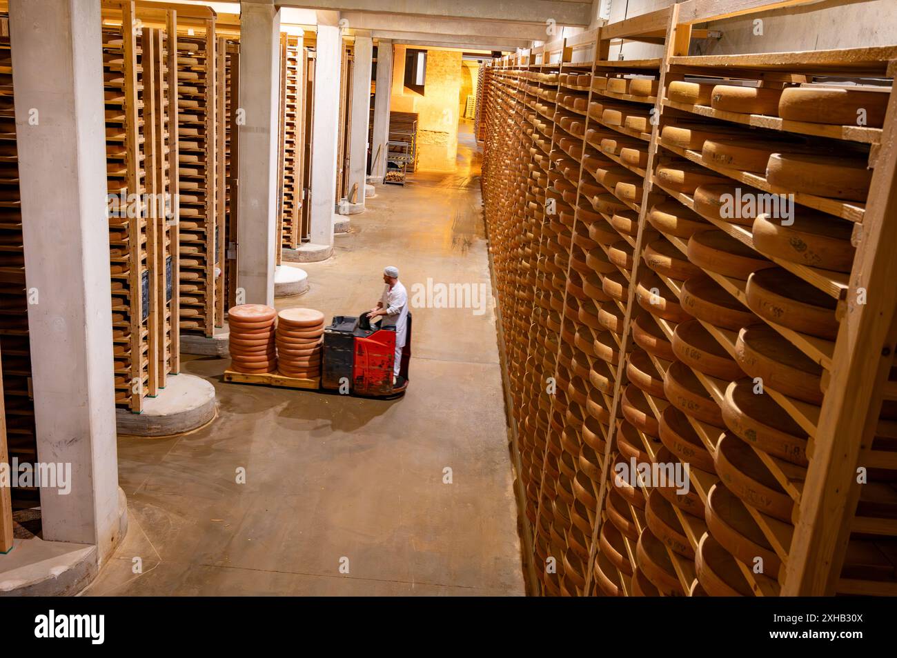 Aging rooms with many shelves in cheese caves, central location for ...