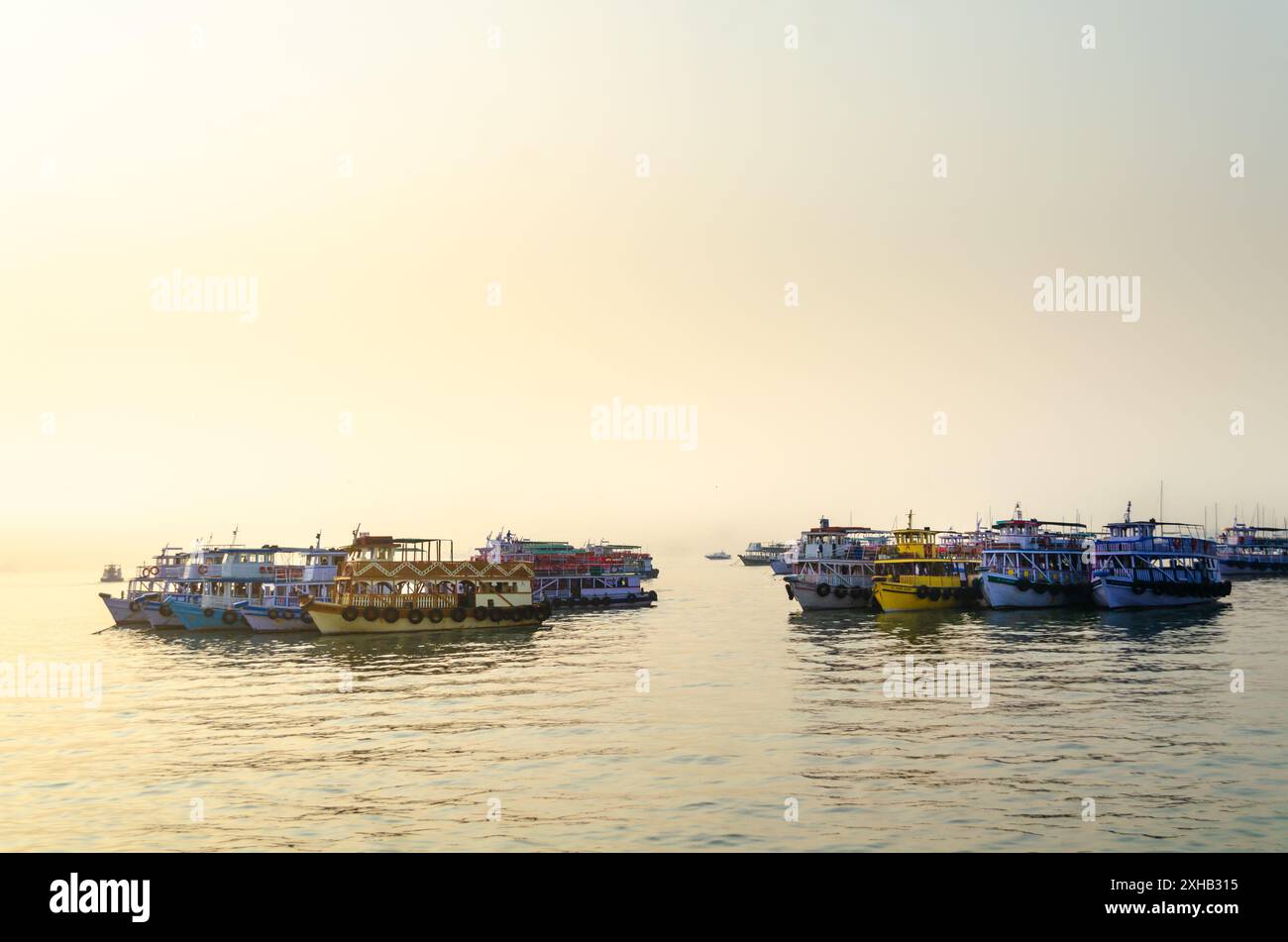 Boats in Mumbai Harbor near Gateway of India at sunset, Mumbai ...