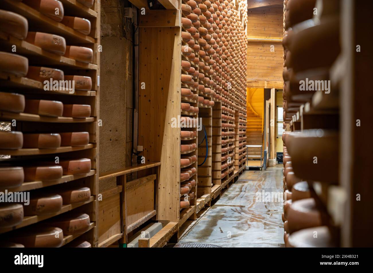 Aging rooms with many shelves in cheese caves, central location for ...