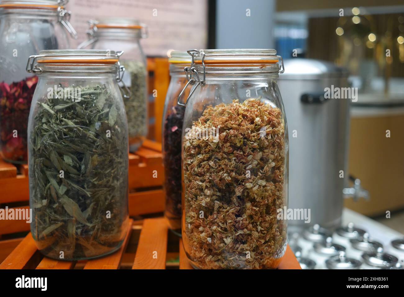 Various kinds of herbal tea in glass jars on wooden pallets Stock Photo ...