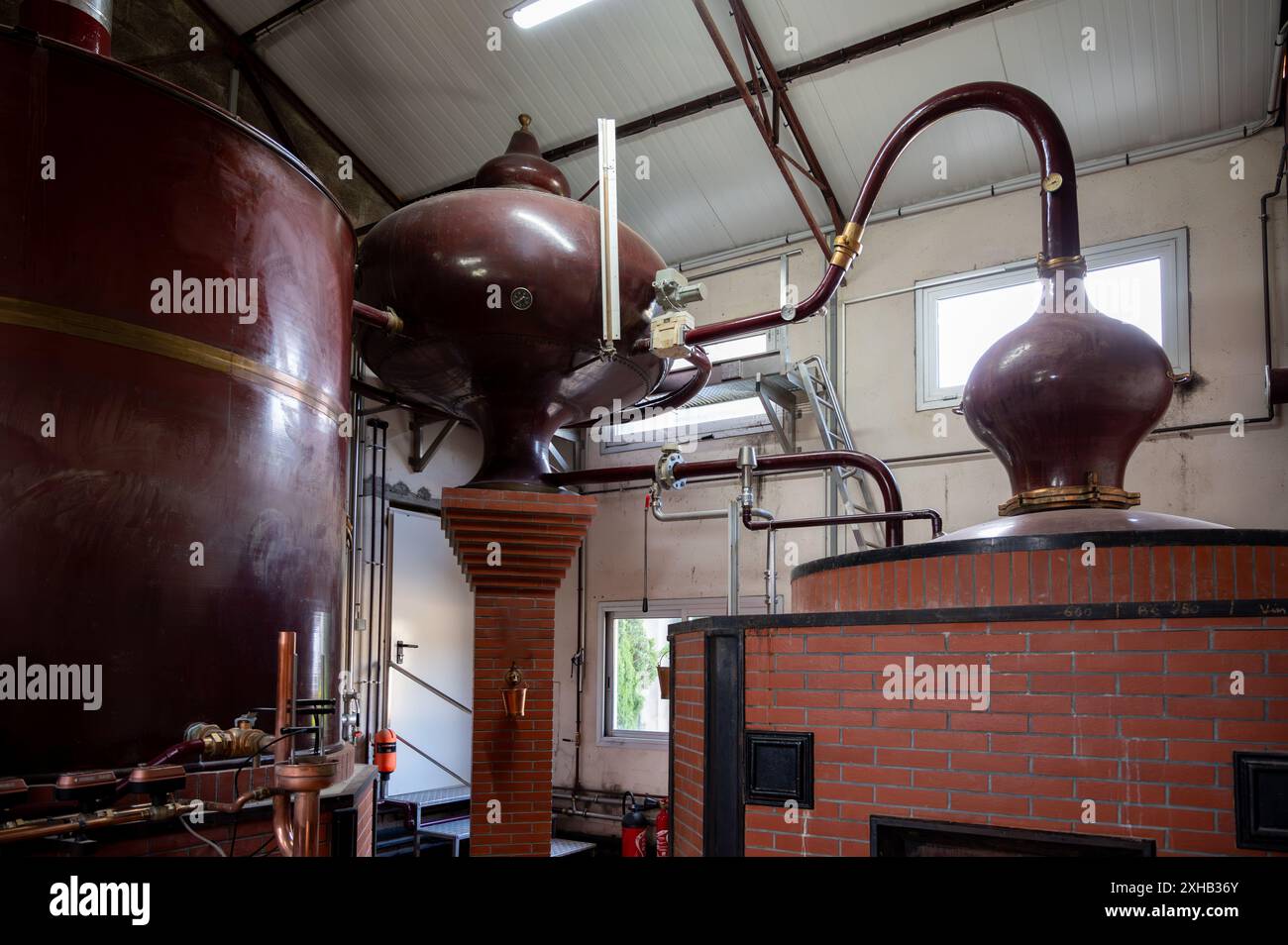 Double distillation process of cognac spirits in Charentias copper ...