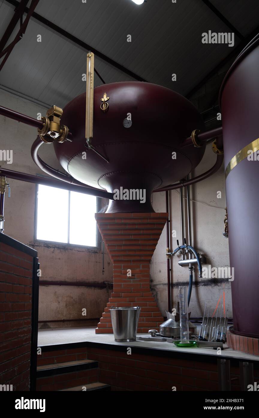 Double distillation process of cognac spirits in Charentias copper ...