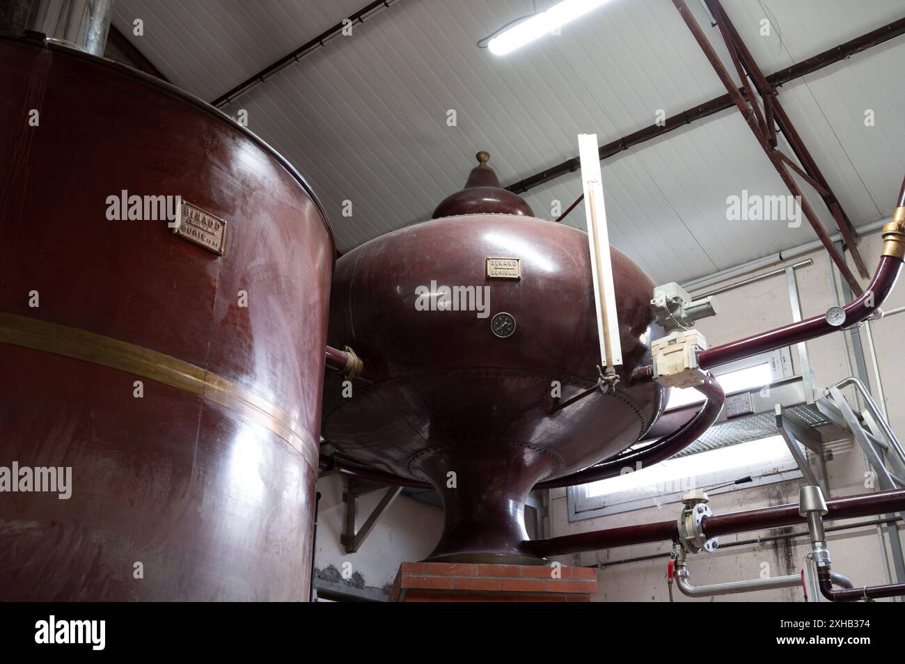 Double distillation process of cognac spirits in Charentias copper ...