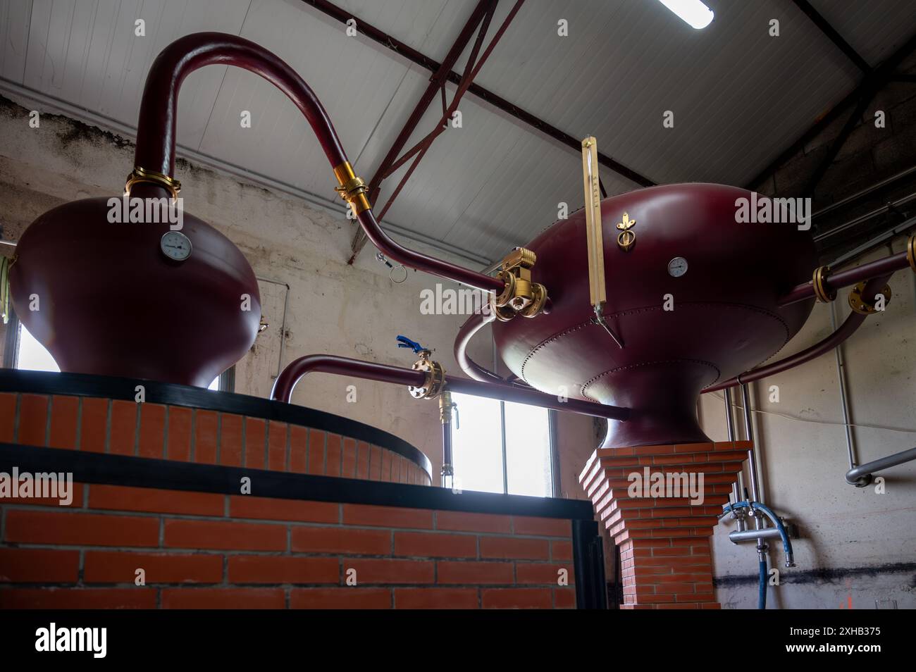 Double distillation process of cognac spirits in Charentias copper ...