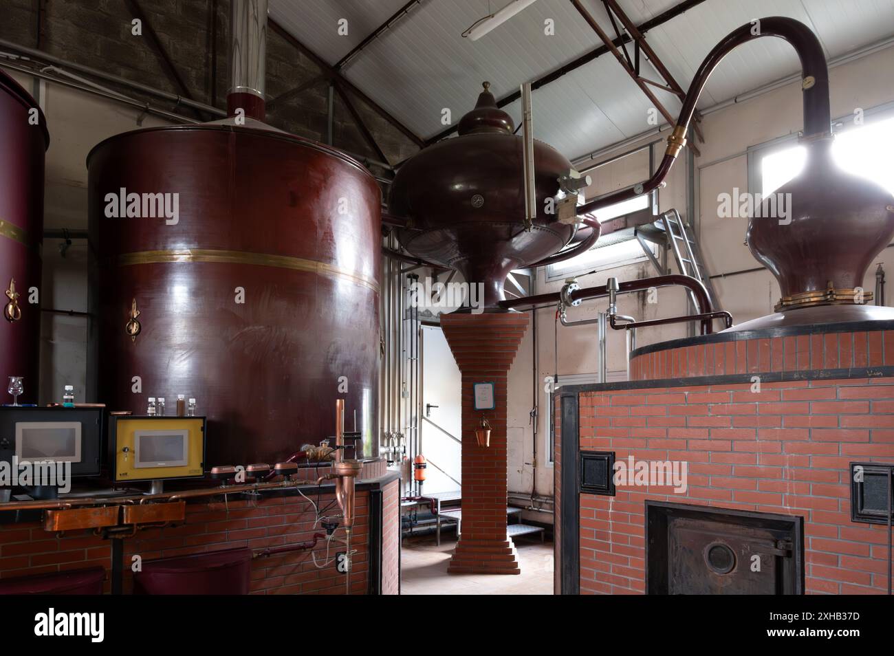 Double distillation process of cognac spirits in Charentias copper ...