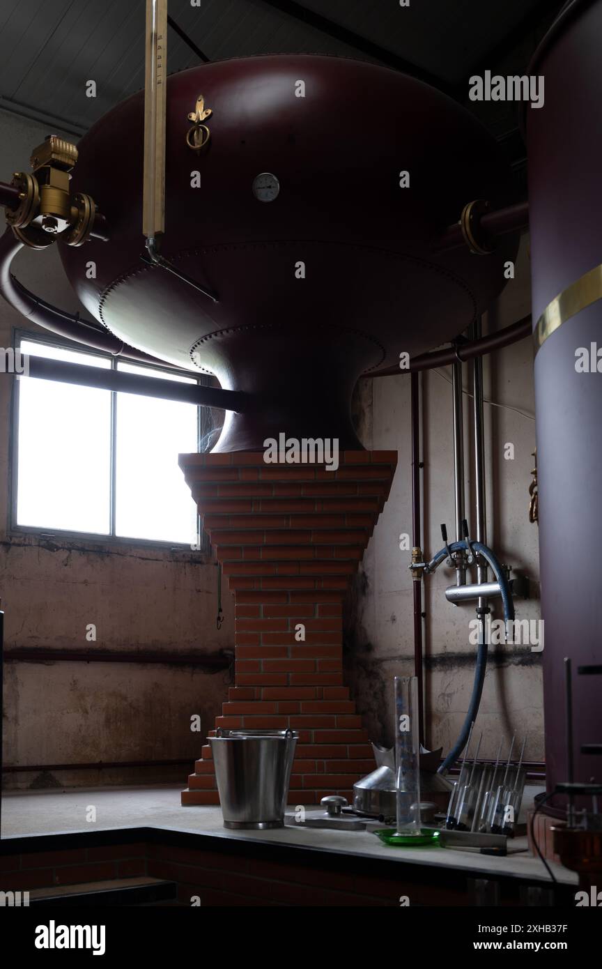 Double distillation process of cognac spirits in Charentias copper ...
