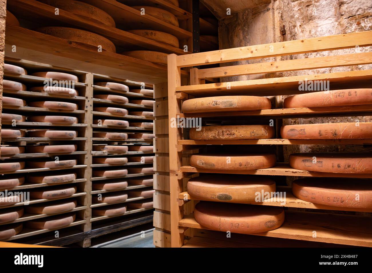 Aging rooms with many shelves in cheese caves, central location for ...