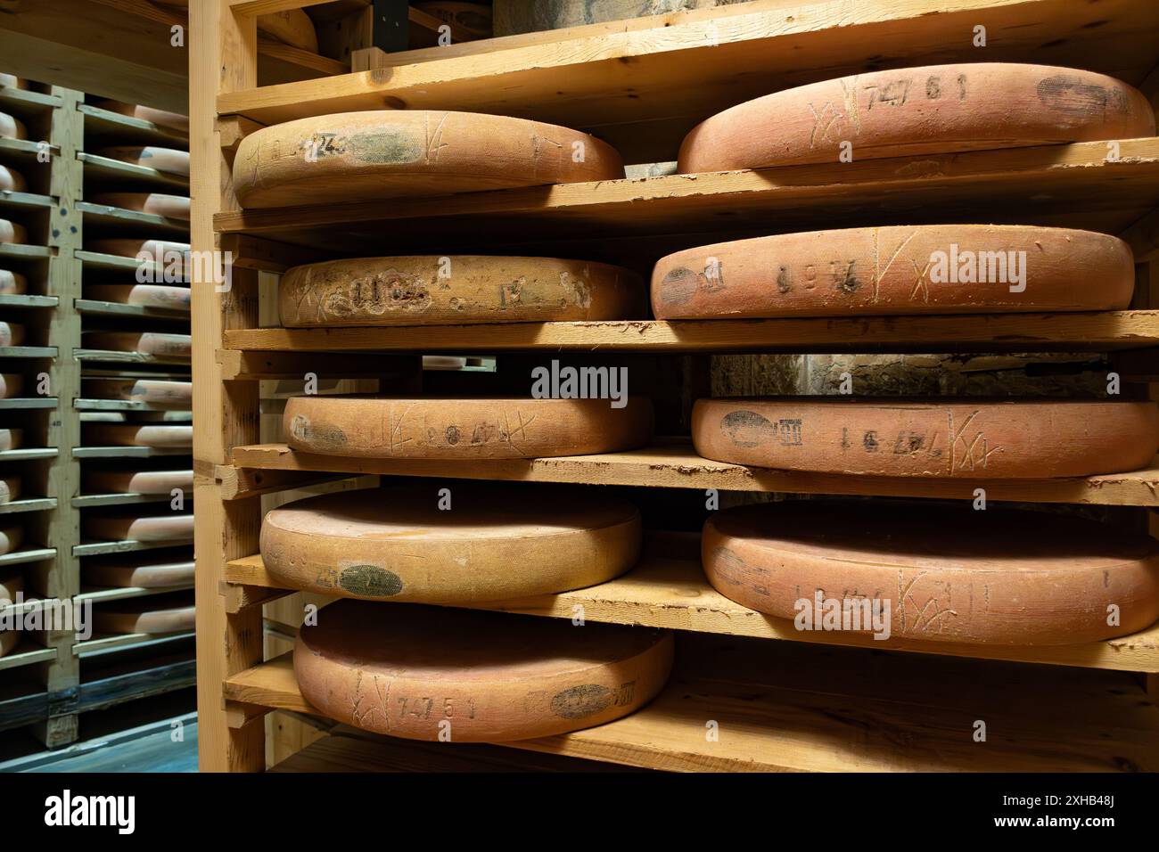 Aging rooms with many shelves in cheese caves, central location for ...