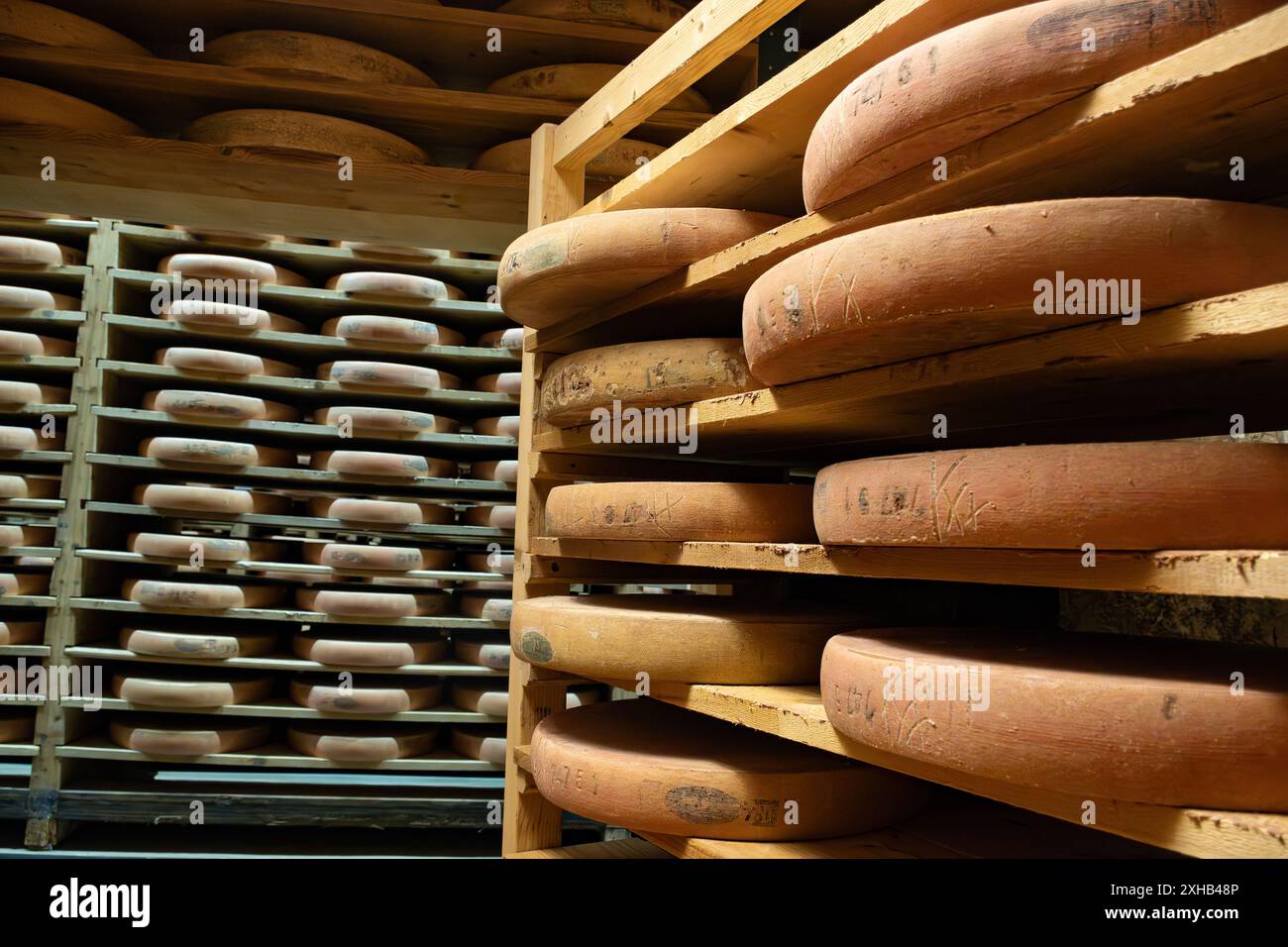 Aging rooms with many shelves in cheese caves, central location for ...