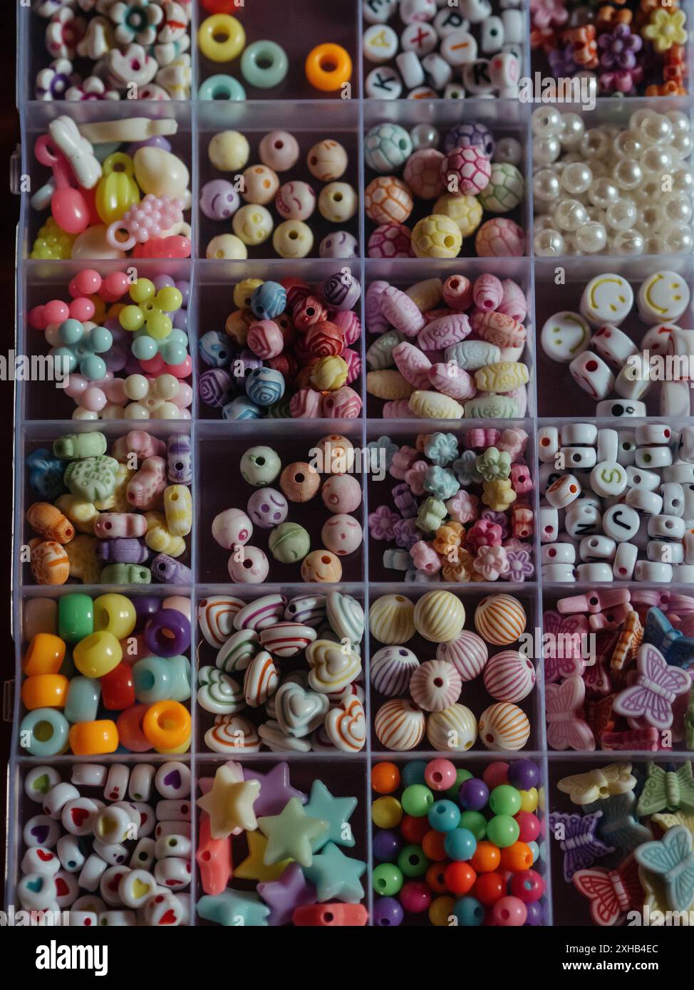 Kids Bead Set: A vertical, straight-from-above close-up shot captures ...