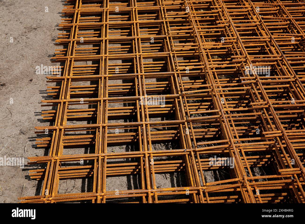Reinforcing steel wire mesh laying on the ground of a construction site ...