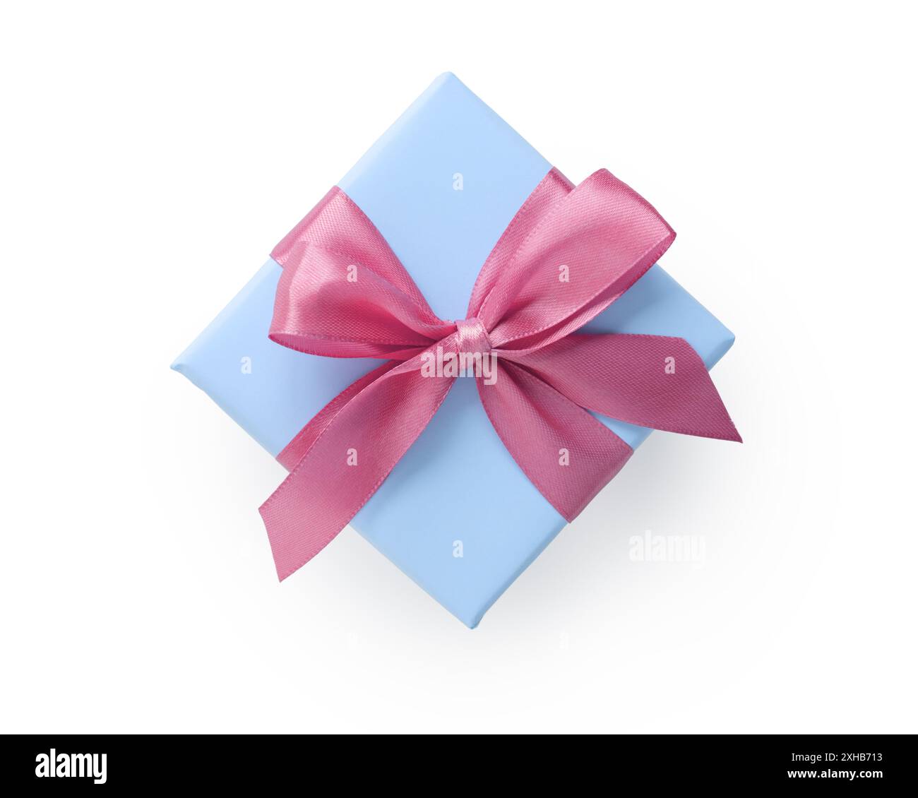 Top view of blue gift box with pink ribbon bow isolated on white ...