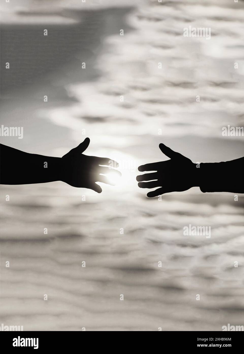 The hands of a couple in the sunset. Silhouette of helping hand concept ...