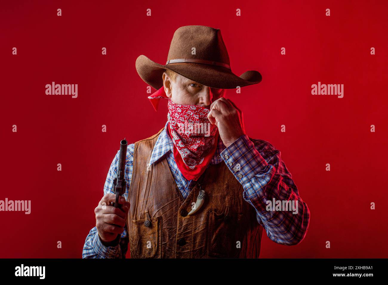 American bandit in mask, western man with hat. Portrait of man wearing ...