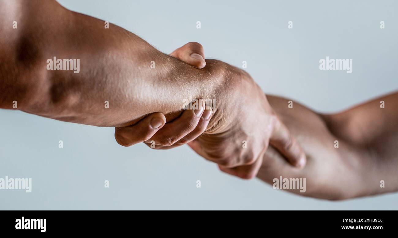 Two hands, helping arm friend, teamwork. Helping hand concept and ...