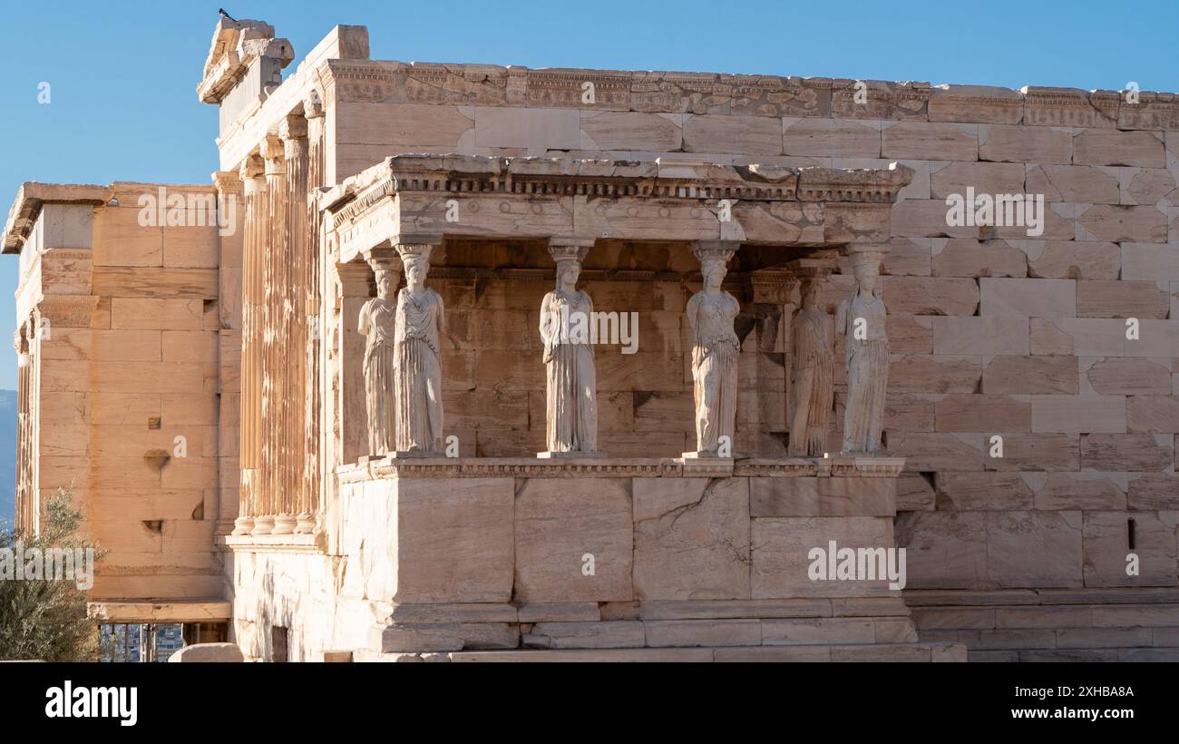 Sculptures of women at the entrance of the Athenian Acropolis temple of ...