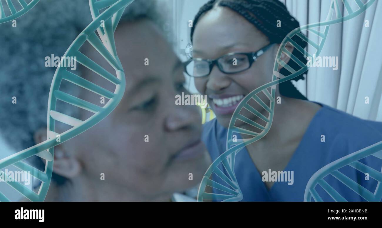 Medical professional smiling, assisting elderly patient with DNA helix ...