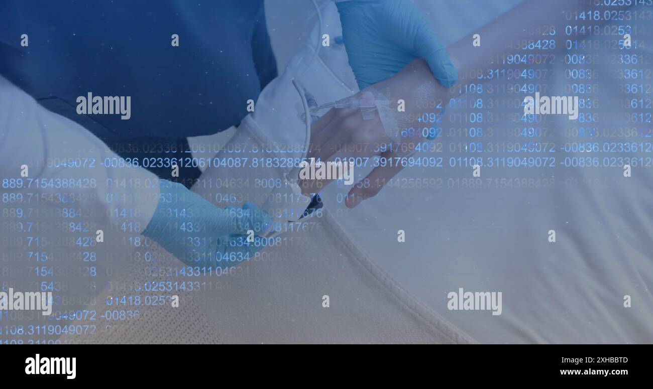 Administering IV drip, healthcare professional wearing gloves providing patient care. Medical ...