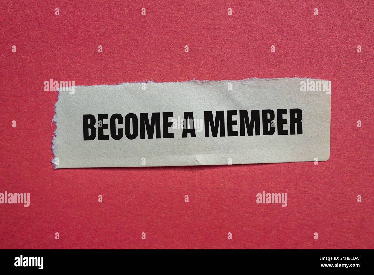 Become a member message written on ripped paper with red background ...