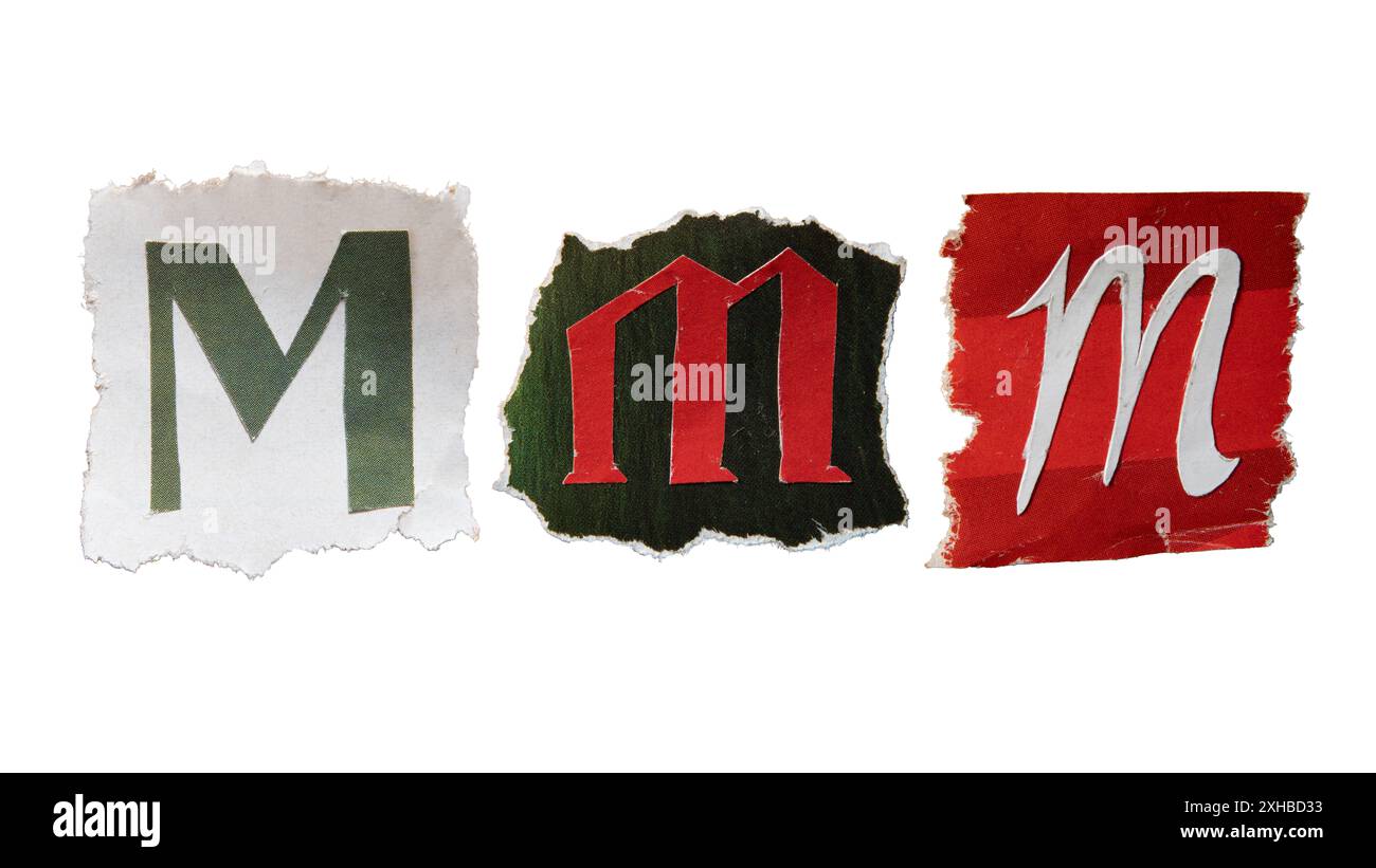 M alphabet torn from a magazine paper on white background with clipping ...