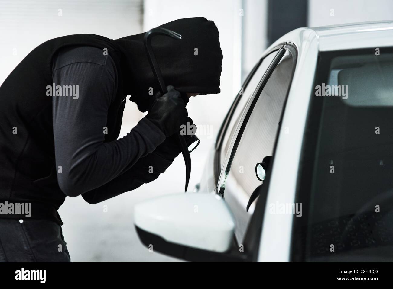 Man, car and steal with criminal weapon, safety crisis and illicit ...