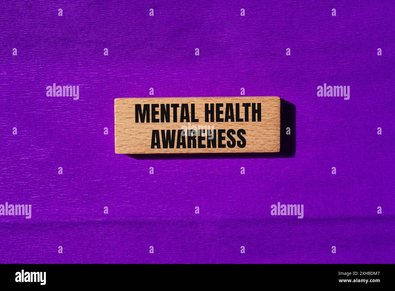 Mental health awareness message written on wooden blocks with purple ...