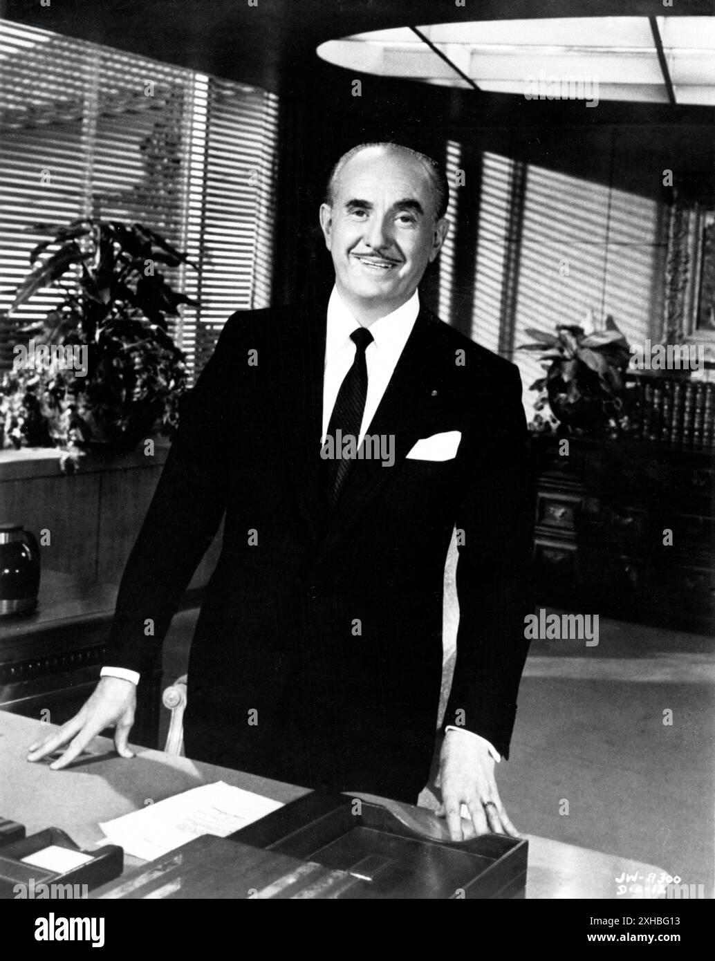 Executive Producer JACK L. WARNER circa 1945 portrait in his office publicity for Warner Bros ...