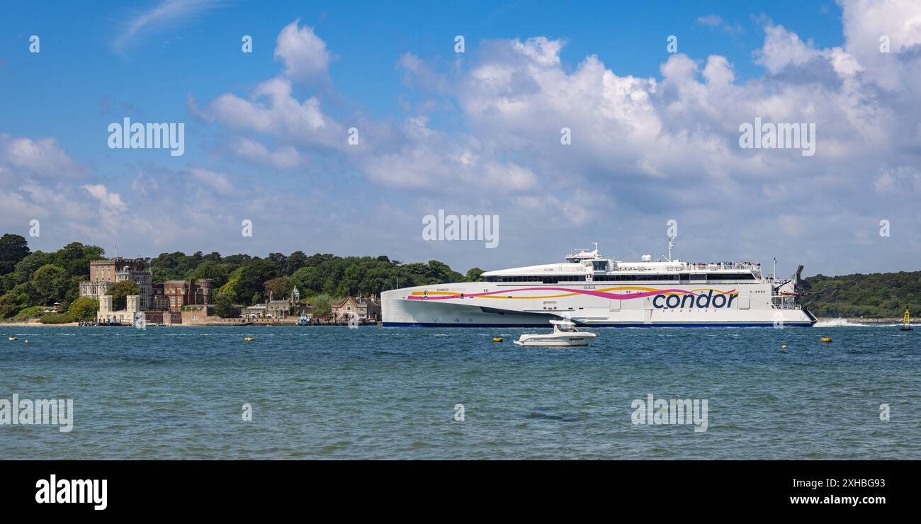 HSC Condor Ferry Liberation departing Poole Harbour, with Brownsea Island in the distance ...