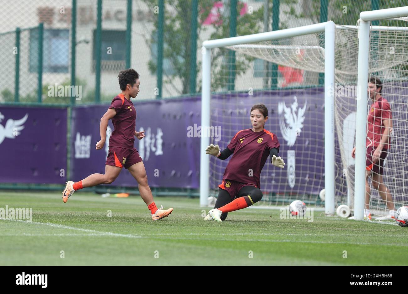Dalian, China's Liaoning Province. 13th July, 2024. Zhang Linyan (L) of ...