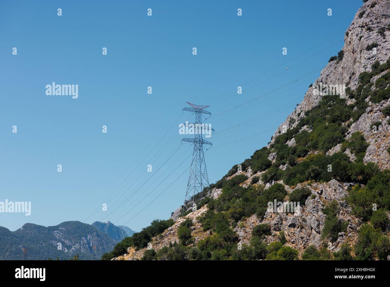 high voltage transmission line in mountains Stock Photo - Alamy