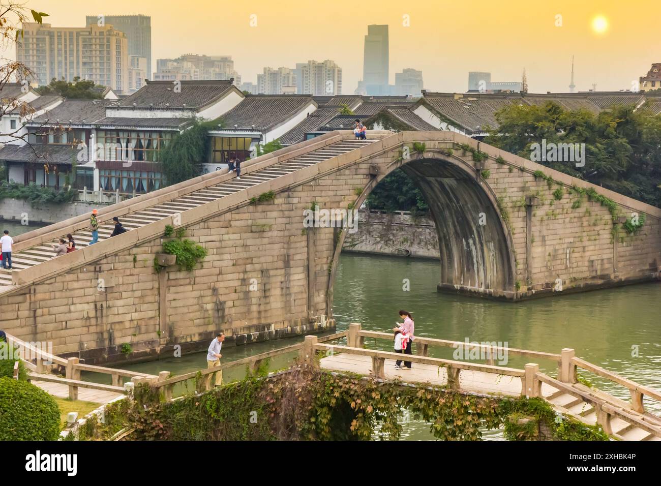 Sunset over the historic Wumen bridge in Panmen scenic area in Suzhou ...