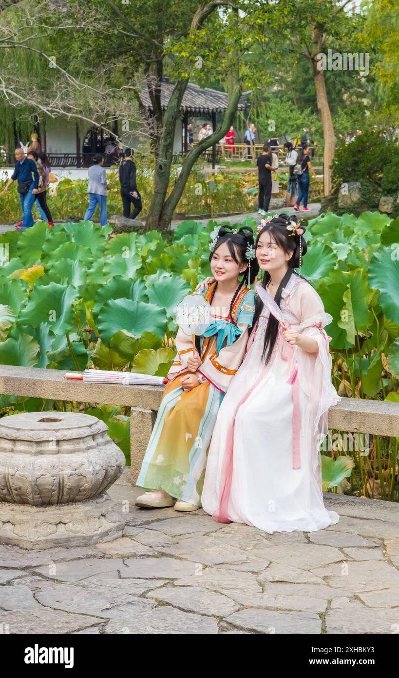 Young women in traditional costume posing in the humble administrators ...